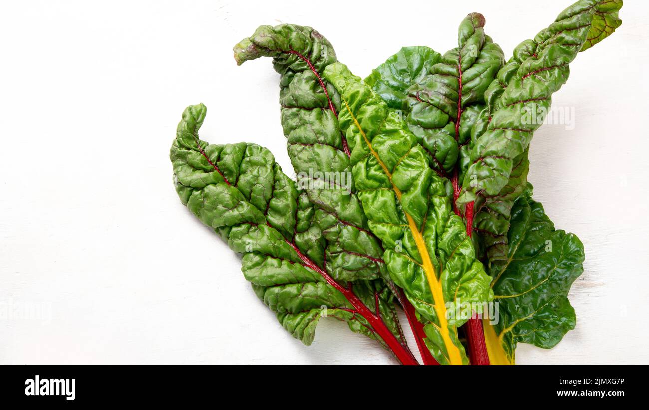 Raw chard on light background. Highly nutritious leaves. Popular ...