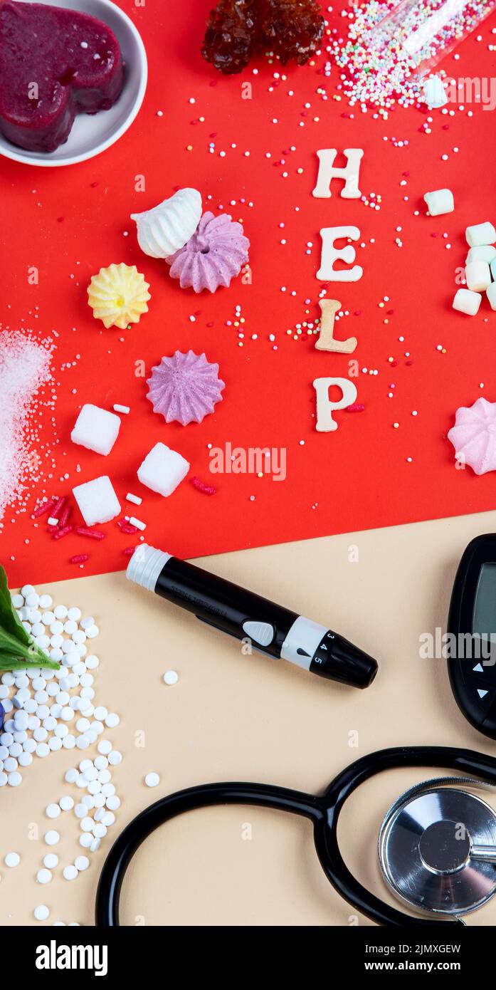 Mix of sweets and candy with sugar spread and written text in unhealthy ...