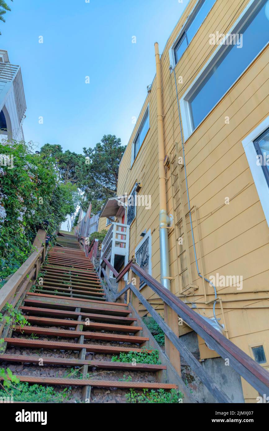 Staircase outside the yellow residential building in San Francisco ...