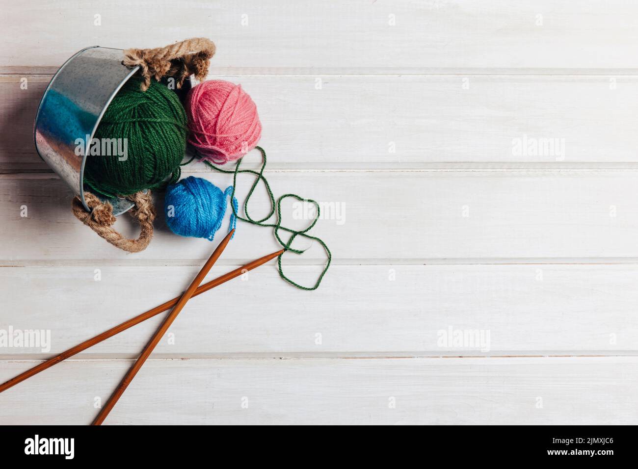 Wool balls metal pot Stock Photo - Alamy