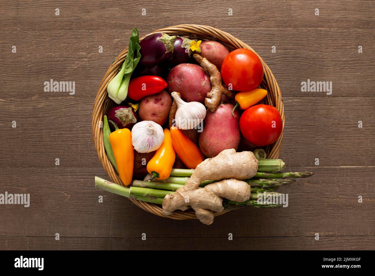 Top view basket with vegetables Stock Photo - Alamy