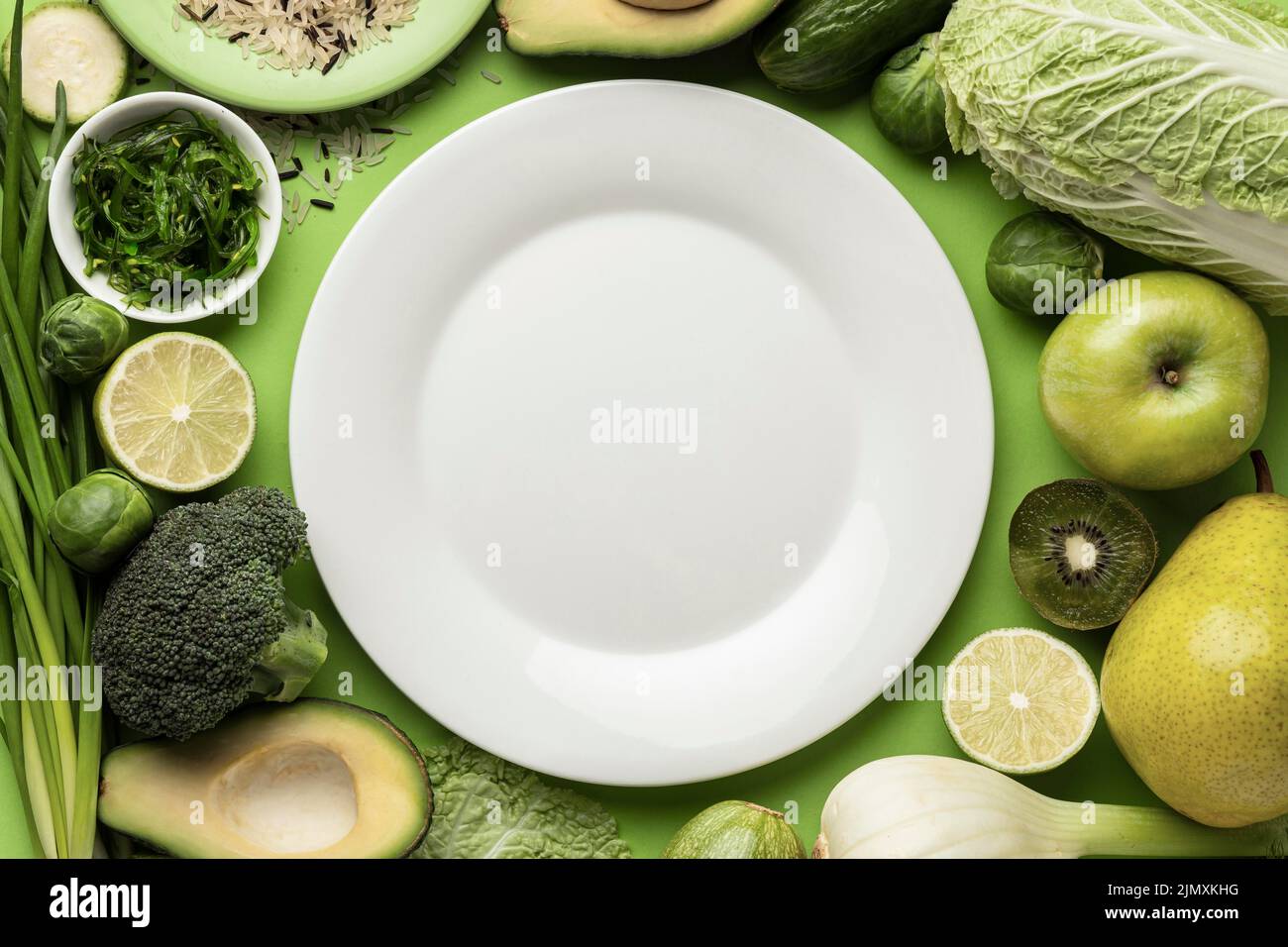 Top view plate with green vegetables Stock Photo - Alamy