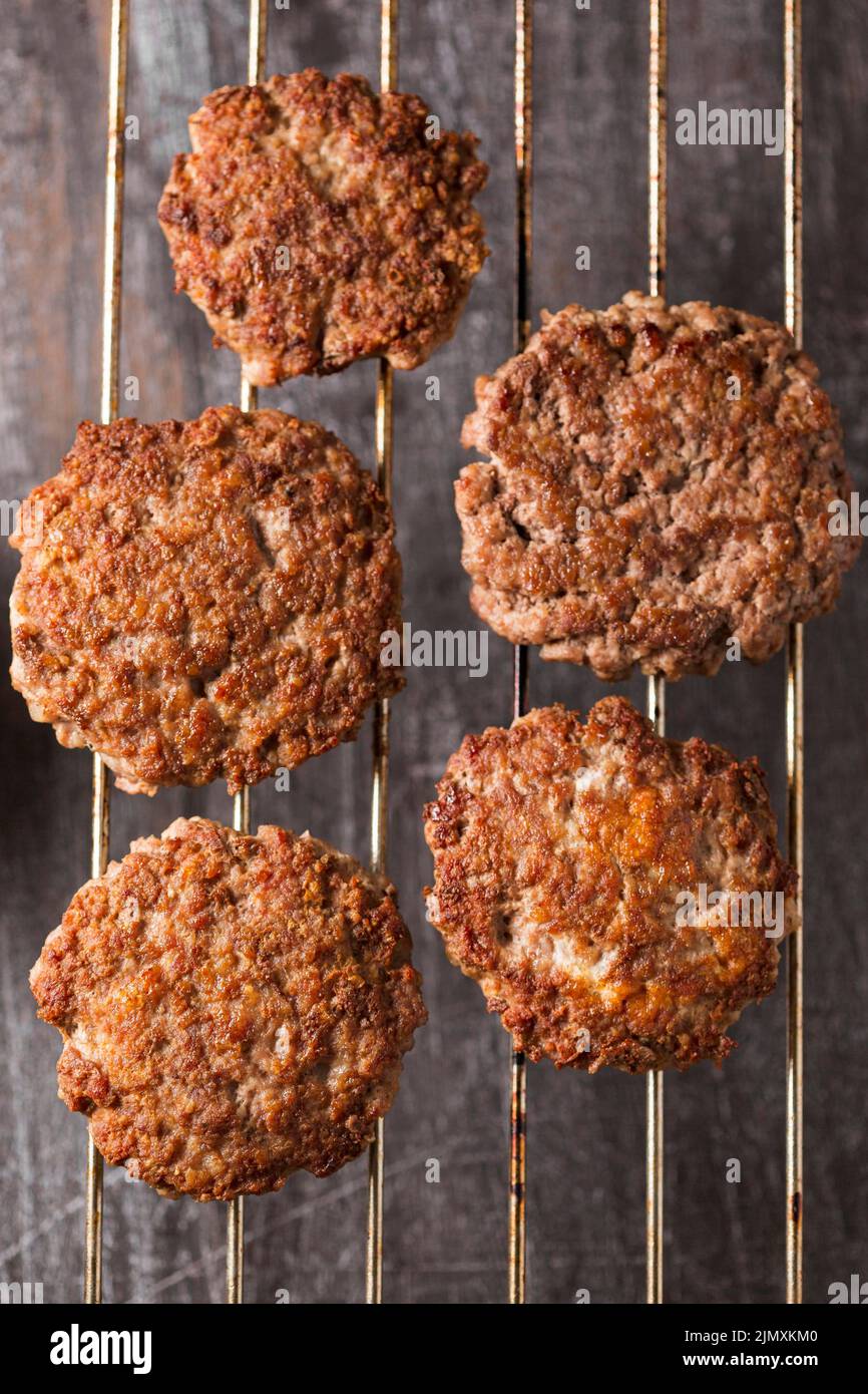 Top view burger patties tray Stock Photo - Alamy