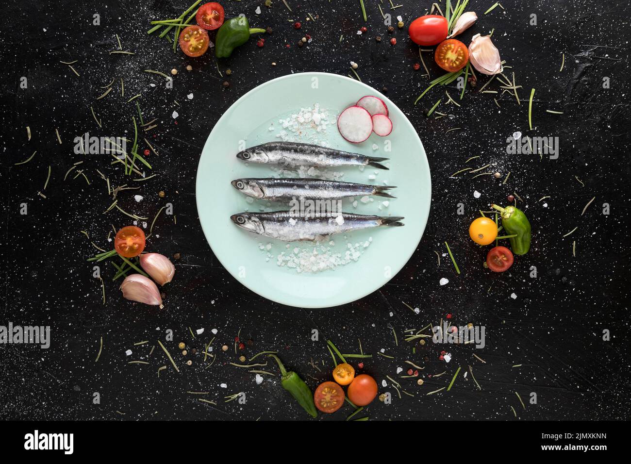 Top view plate with fish garnishes Stock Photo - Alamy