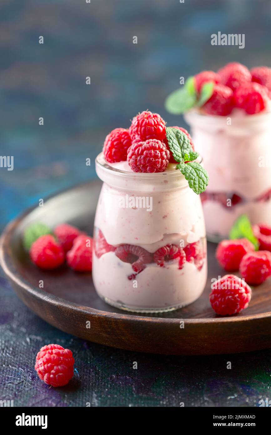 Homemade yogurt with raspberries Stock Photo - Alamy