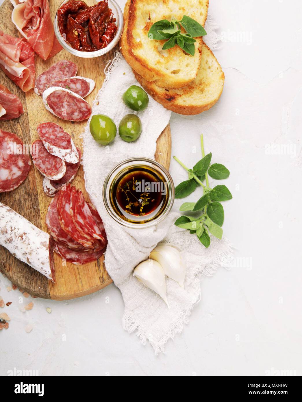 Sausages assortment on light background. Meat product made of finely ...