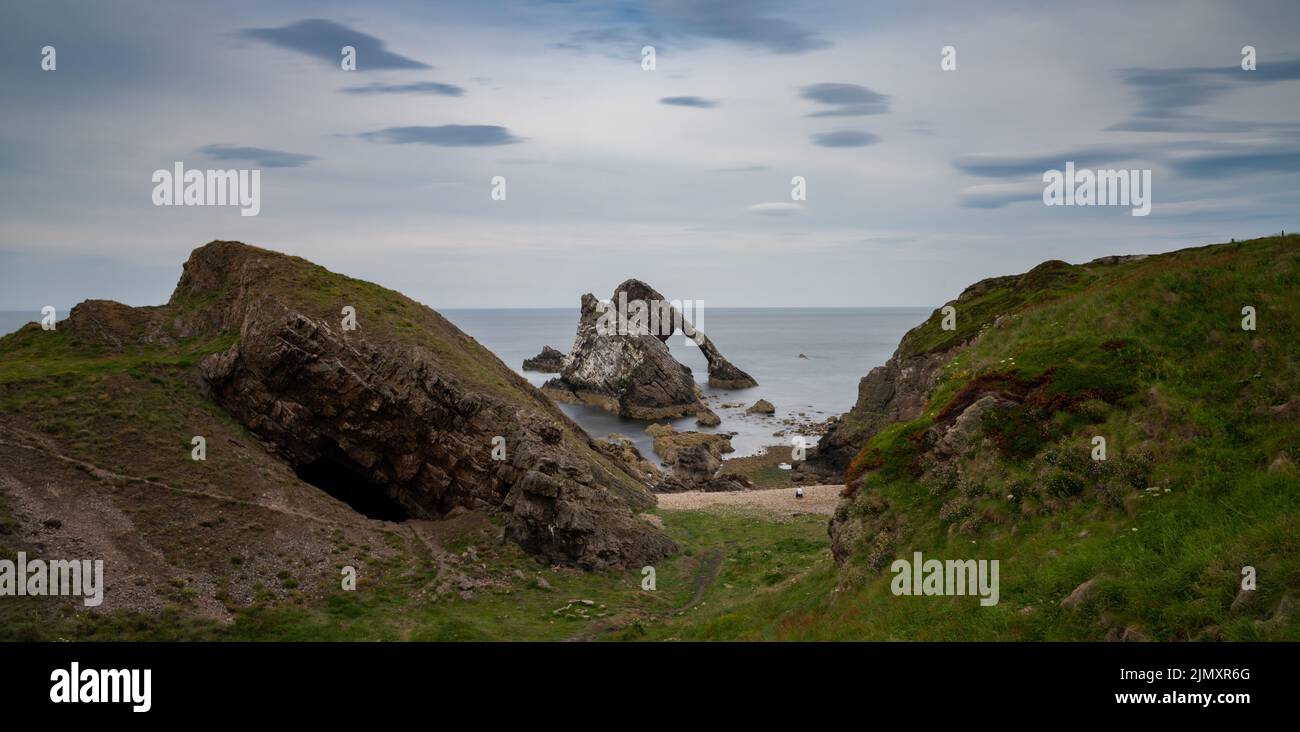 Panorama view of the rocky beach and Bow Fiddle Rock near Portknockie ...