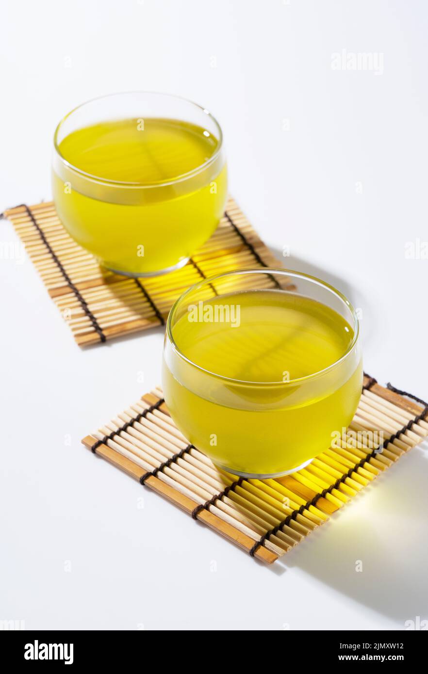 Cold Japanese green tea set against a white background Stock Photo - Alamy