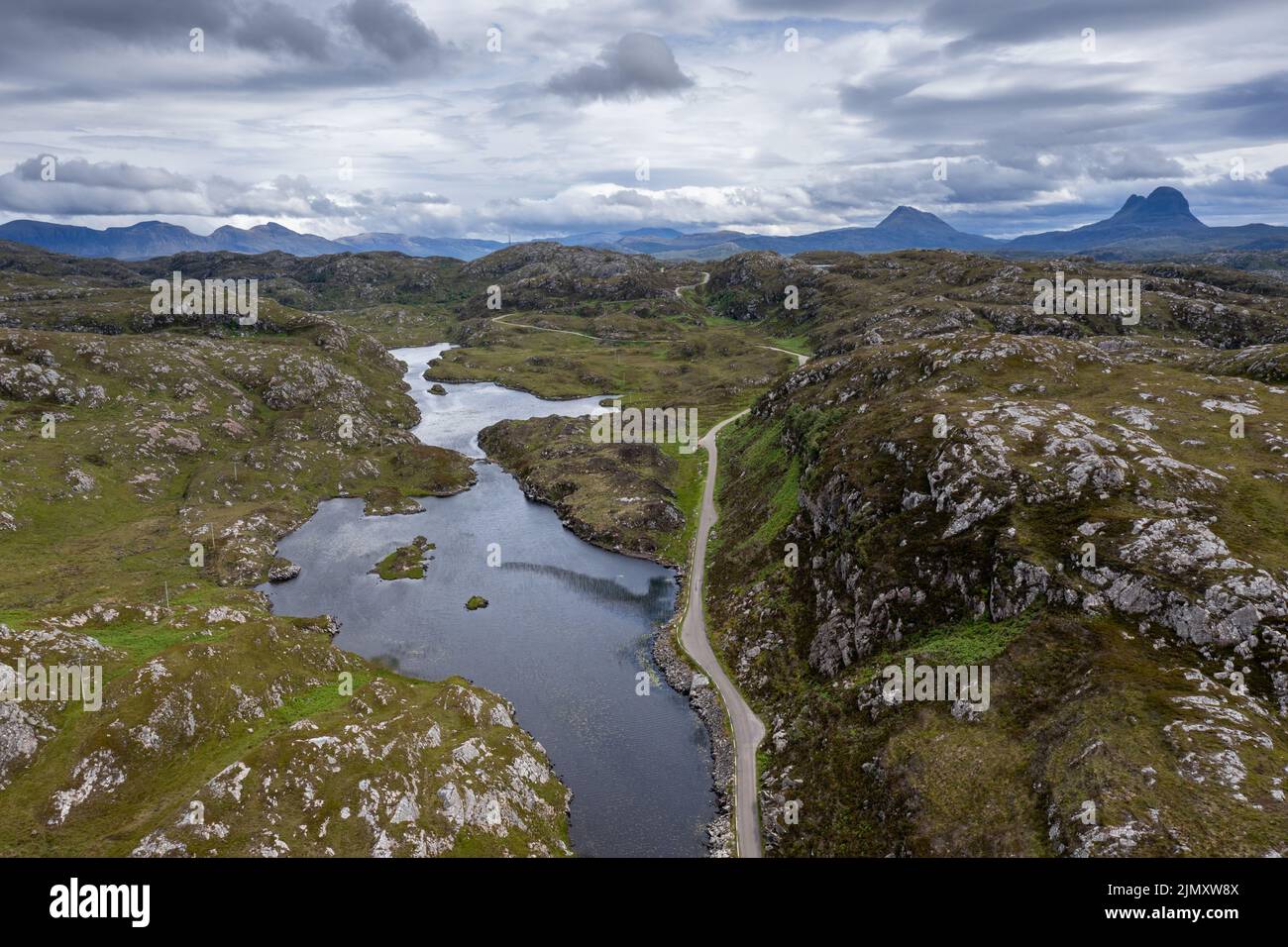 Coastal road on the North Coast 500 scenic drive in the Scottish ... Coastal road on the North Coast 500 scenic drive in the Scottish ...