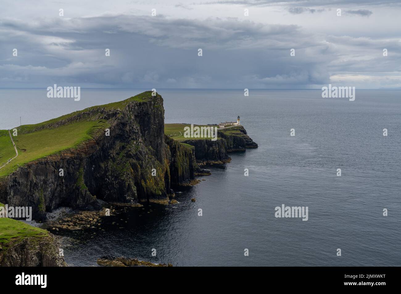 A view of Neist Point on the Minch and the lighthouse on the cliffs ...