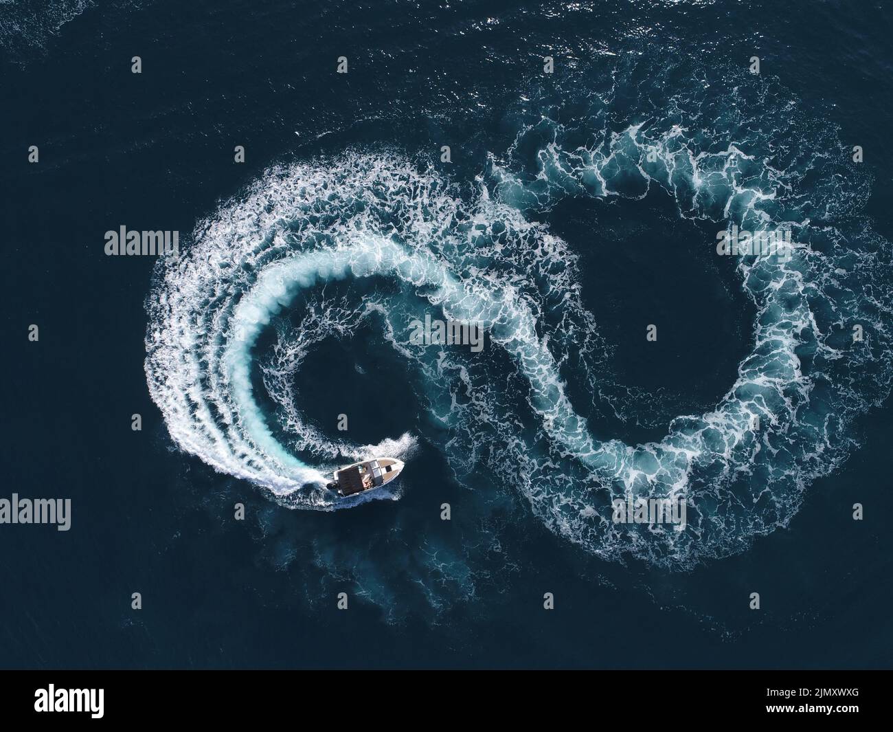 Aerial top view of a white pleasure boat on a summer day. Powerboat ...