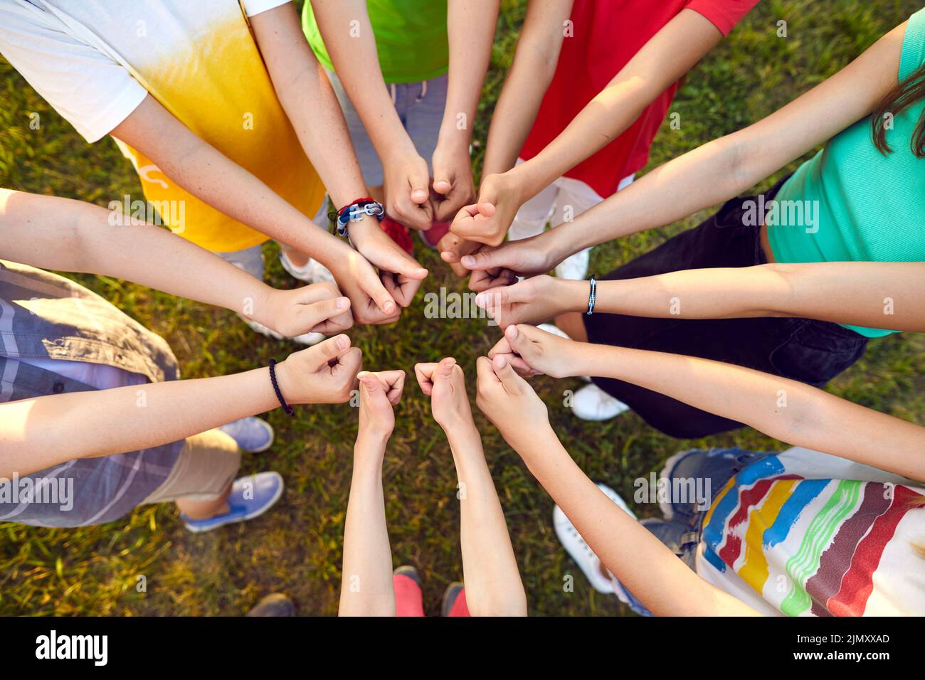 Team Huddle Hands Up Girls