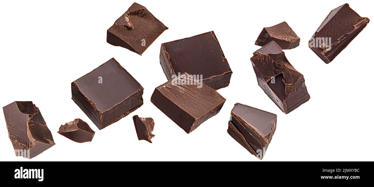 Falling chocolate pieces isolated on white background Stock Photo - Alamy