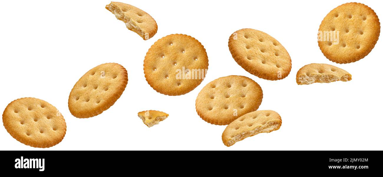 Falling round cheese crackers isolated on white background Stock Photo ...