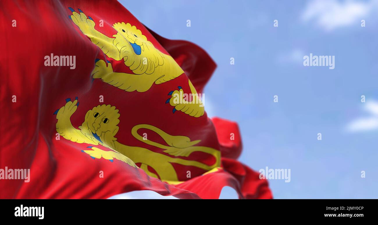 The flag of Normandy region waving in the wind on a clear day Stock ...