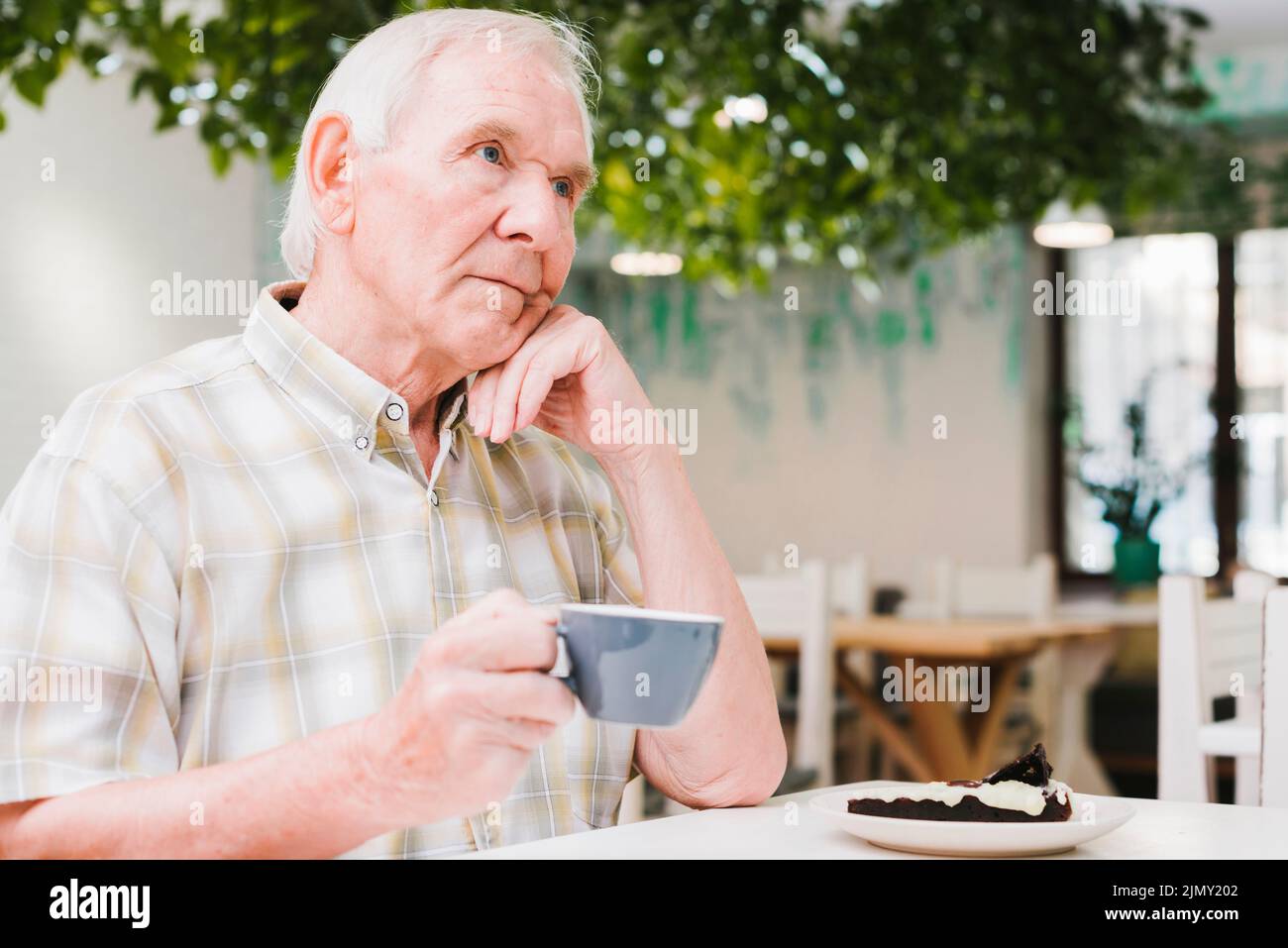 Old man drinking tea hi-res stock photography and images - Alamy