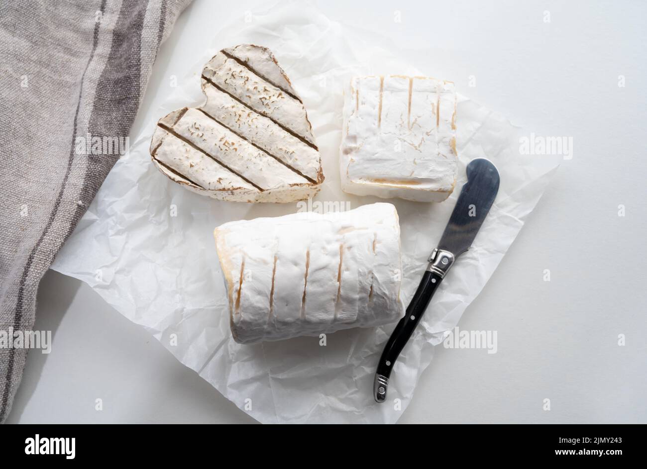French cheeses heartshaped, squared and cylindrical neufchatel cow ...