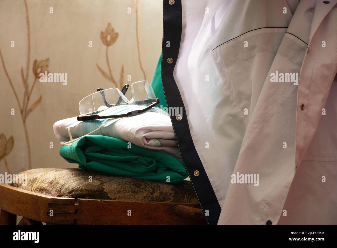 medical uniform on the table in the office, medicine and health ...