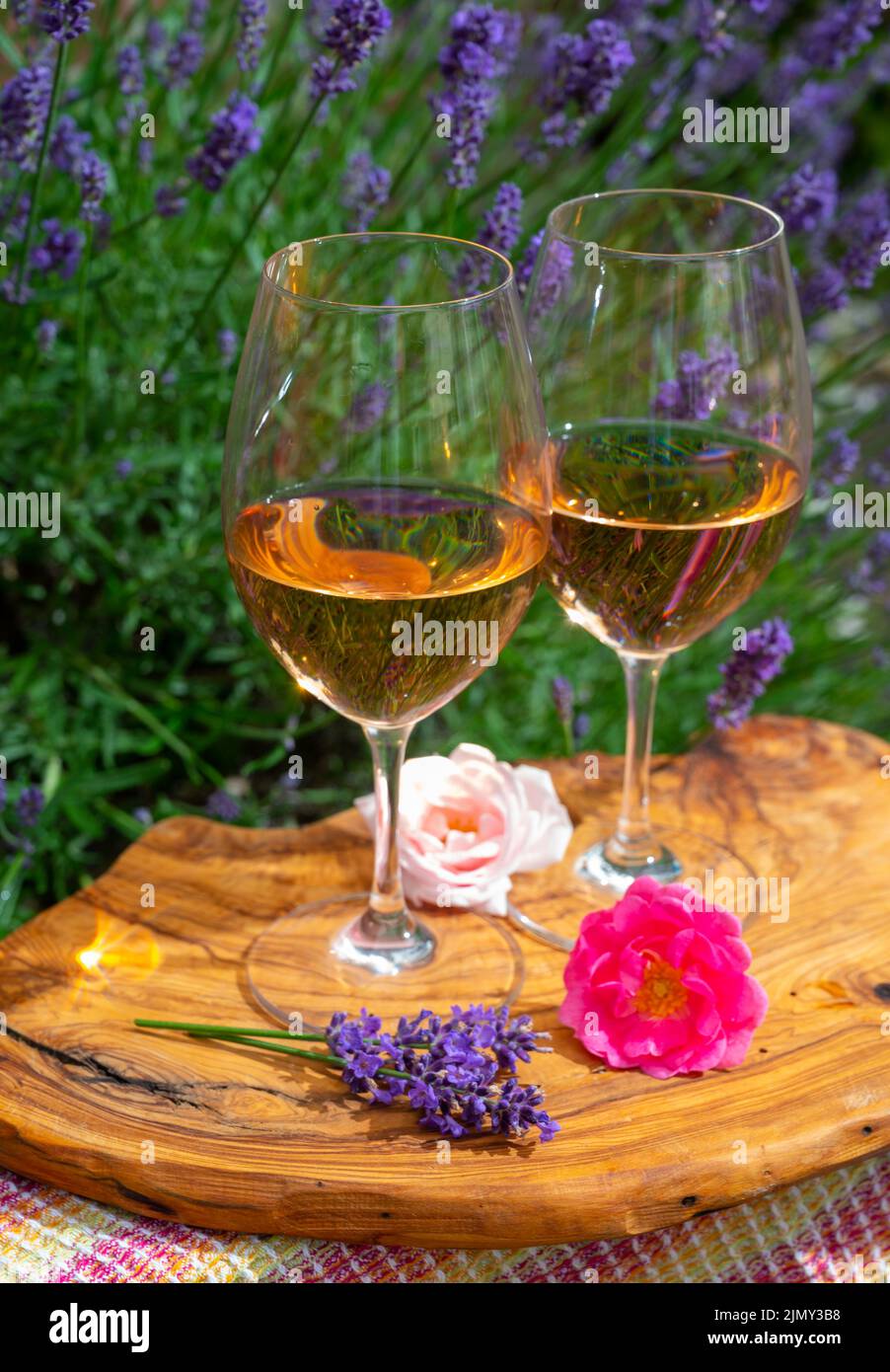 French rose wine from Provence, two glasses of wine with purple ...