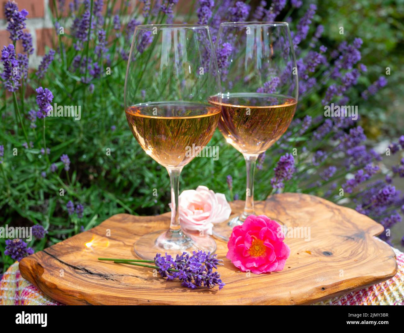 French rose wine from Provence, two glasses of wine with purple ...