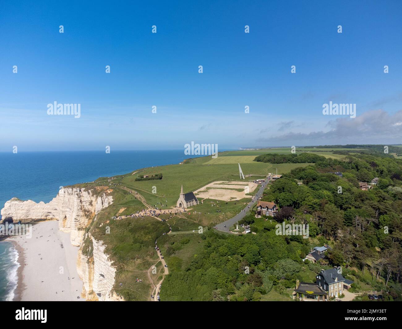 Low tide period and aerial view on white stones on ocean bottom and ...