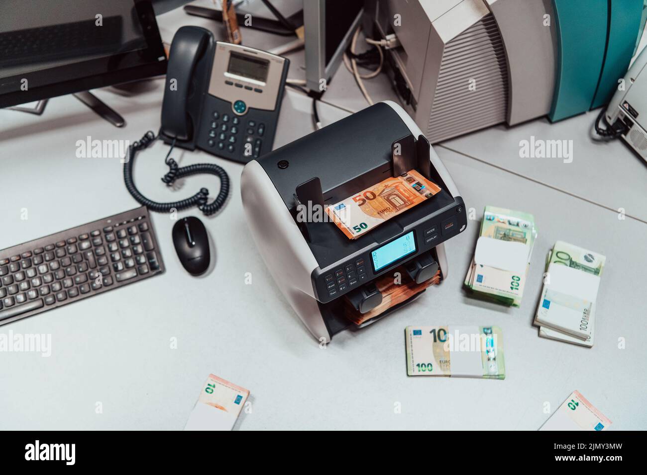 Sorted banknotes placed on the table after it is counted on the ...