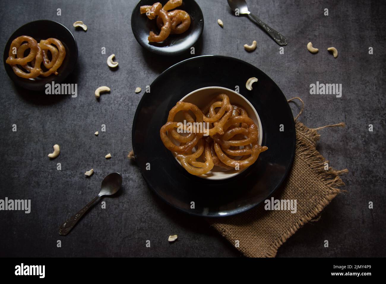 Popular Indian sweet jalebi or imarati made by deep frying in pure ghee ...