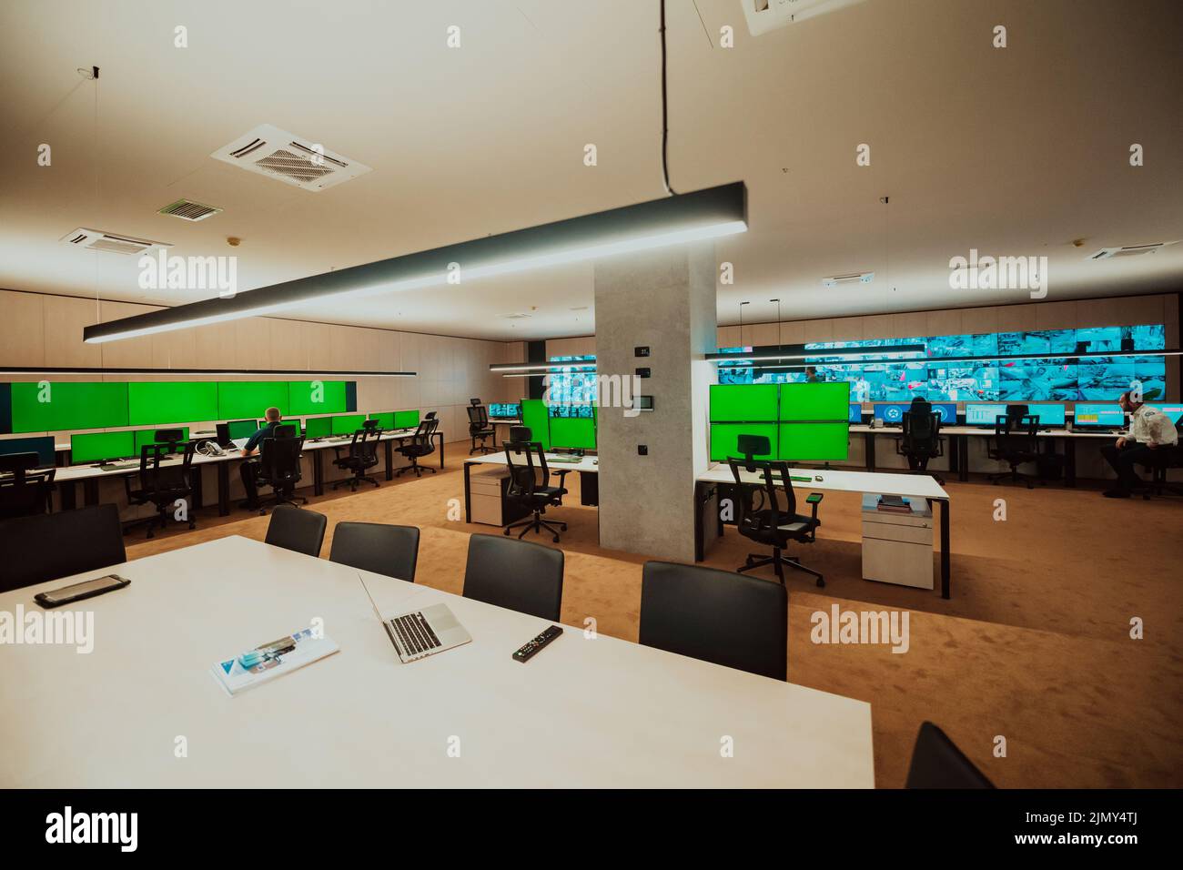 Group of Security data center operators working in a CCTV monitoring ...