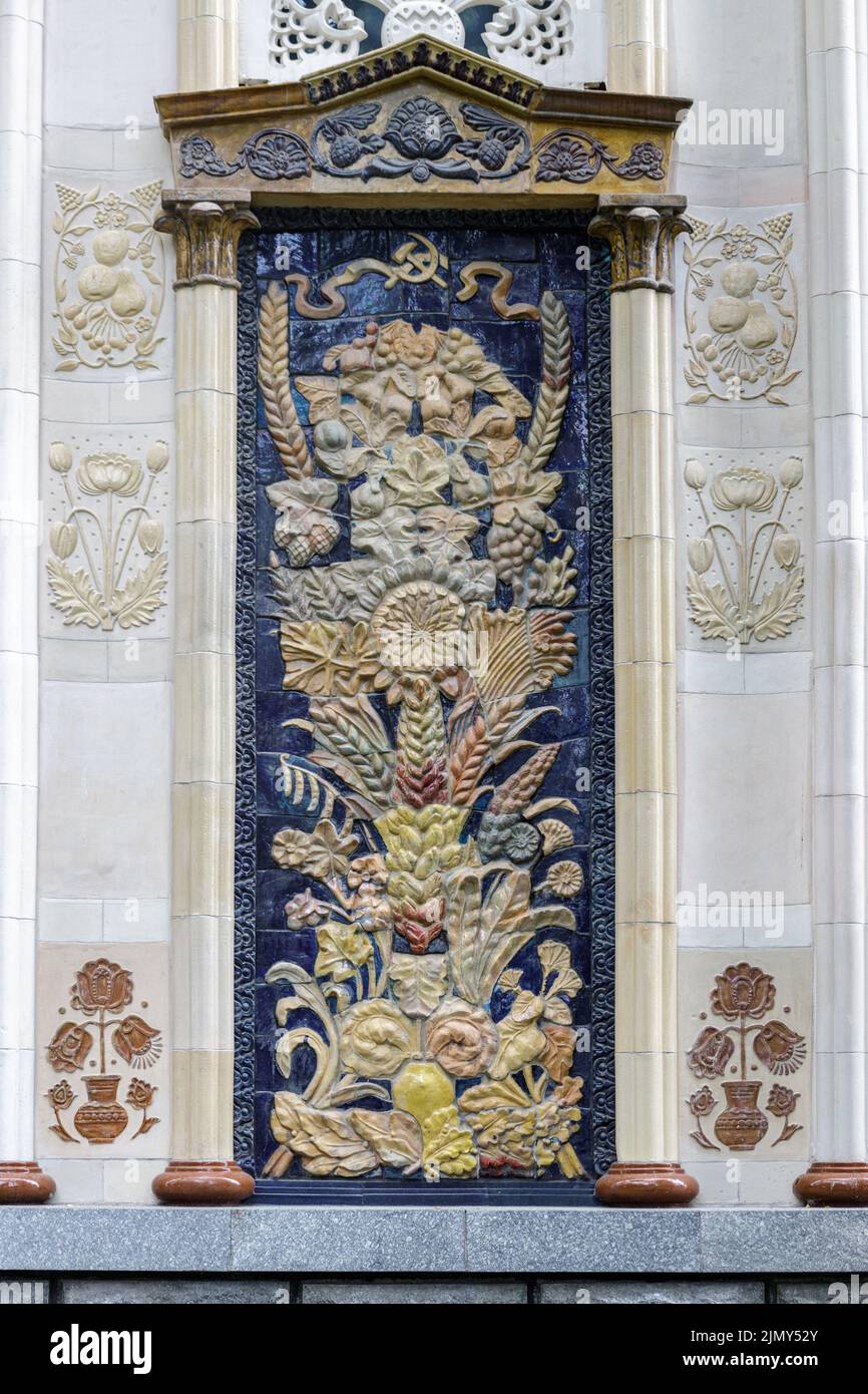 Architectural detail of the decoration of the building. Glazed Ceramic ...