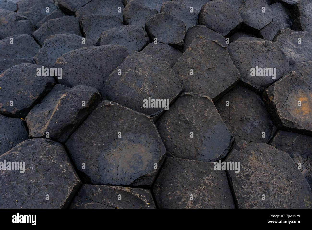 Close-up detail view of the volcanic hexagon basalt rock columns of the ...