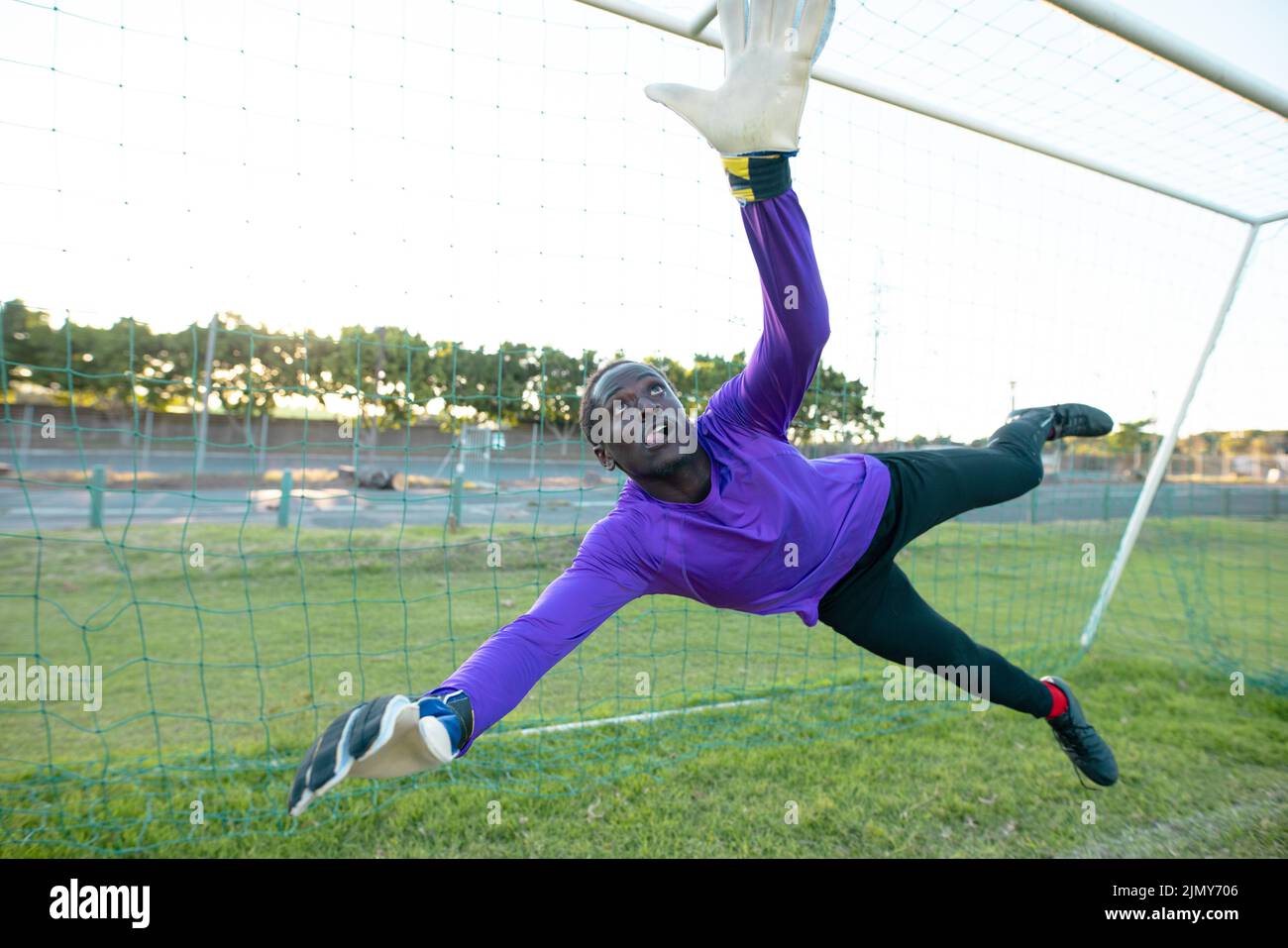 African american boy catching ball hi-res stock photography and images ...