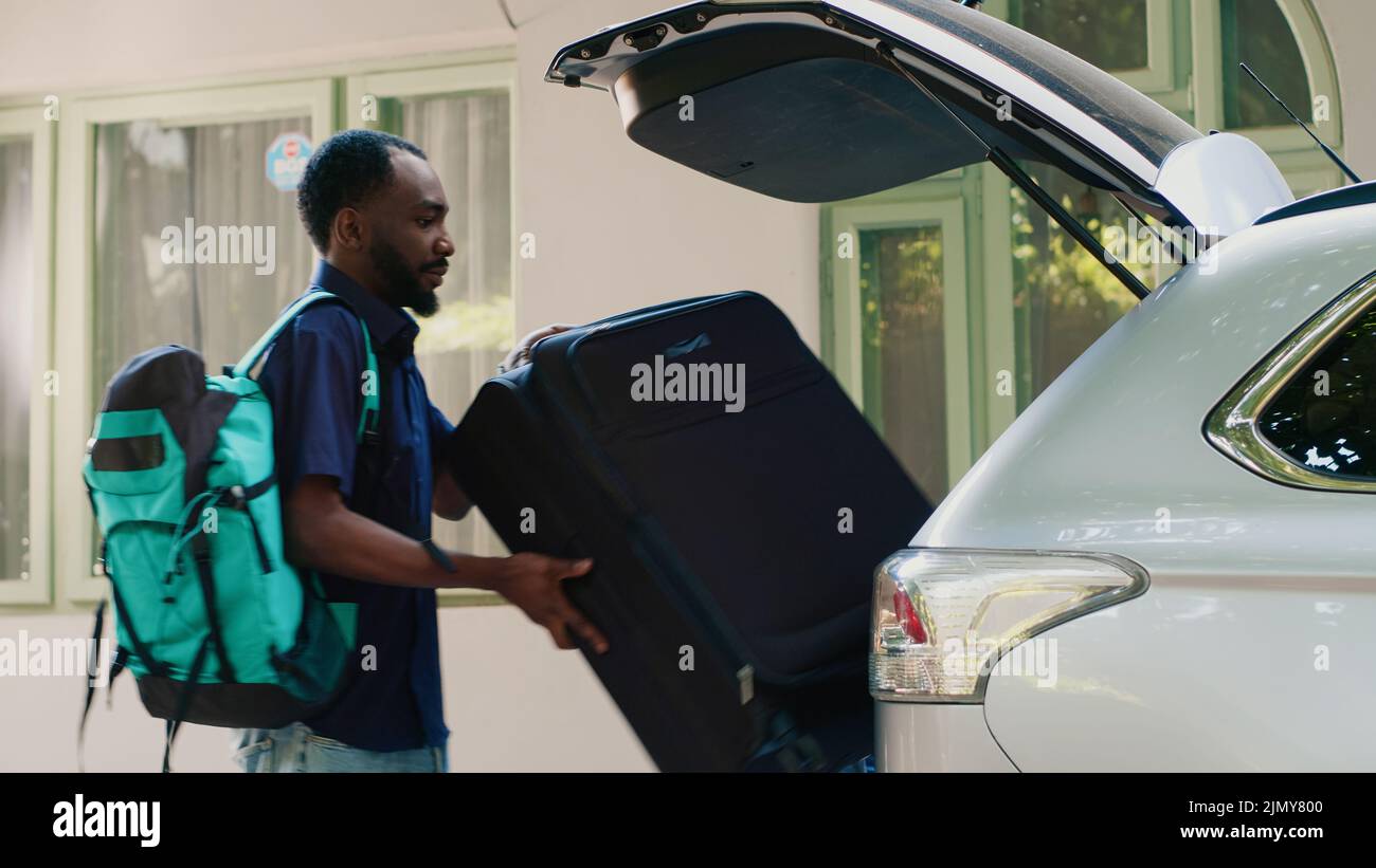 Married people loading baggage trolleys hi-res stock photography and ...
