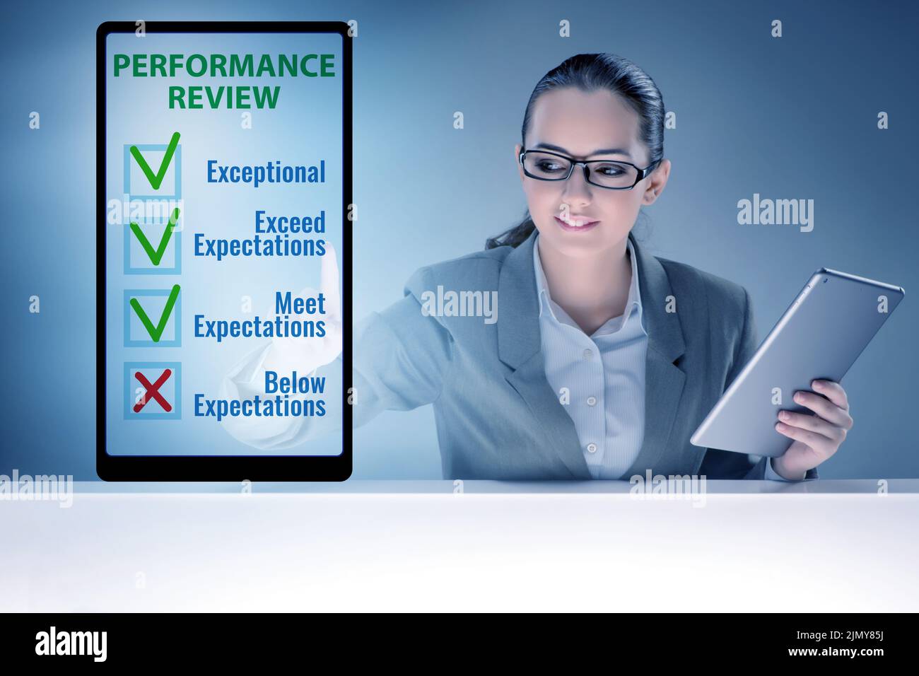 Annual performance review concept with businesswoman Stock Photo - Alamy