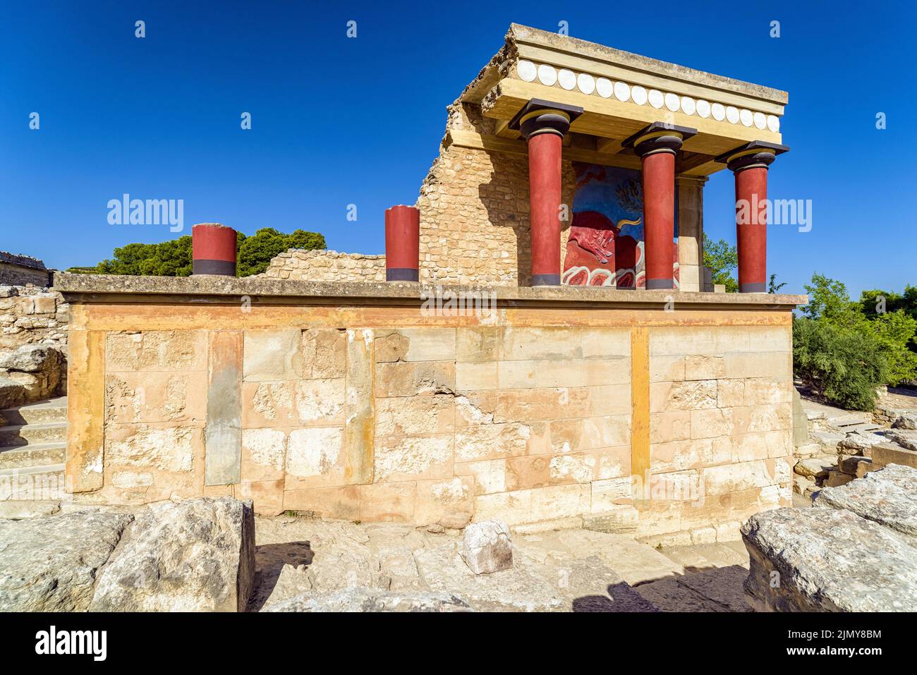 Ancient ruins of Knossos palace with Minoan columns. Largest Bronze Age ...