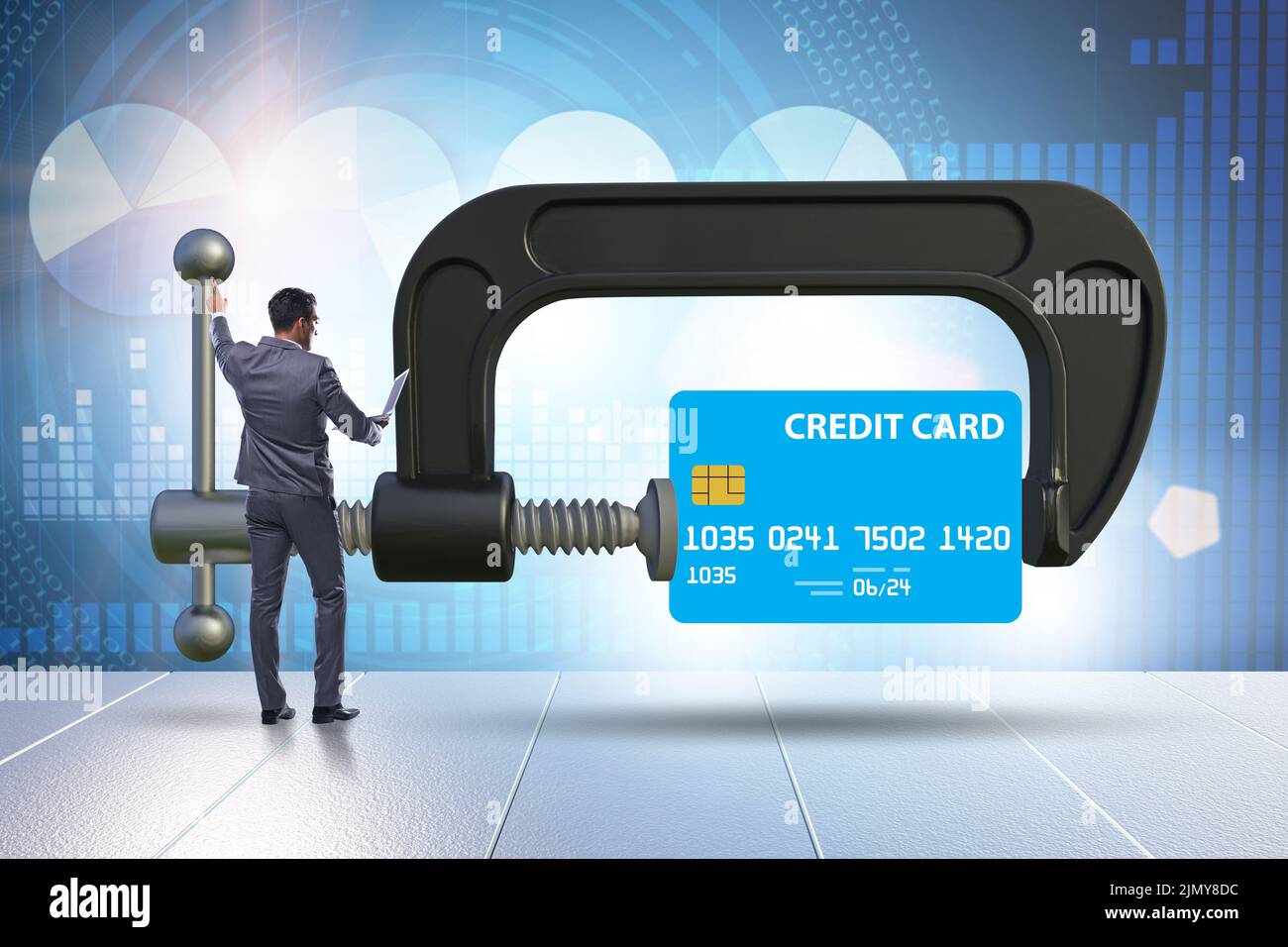 Concept of credit card debt with clamp and businessman Stock Photo - Alamy