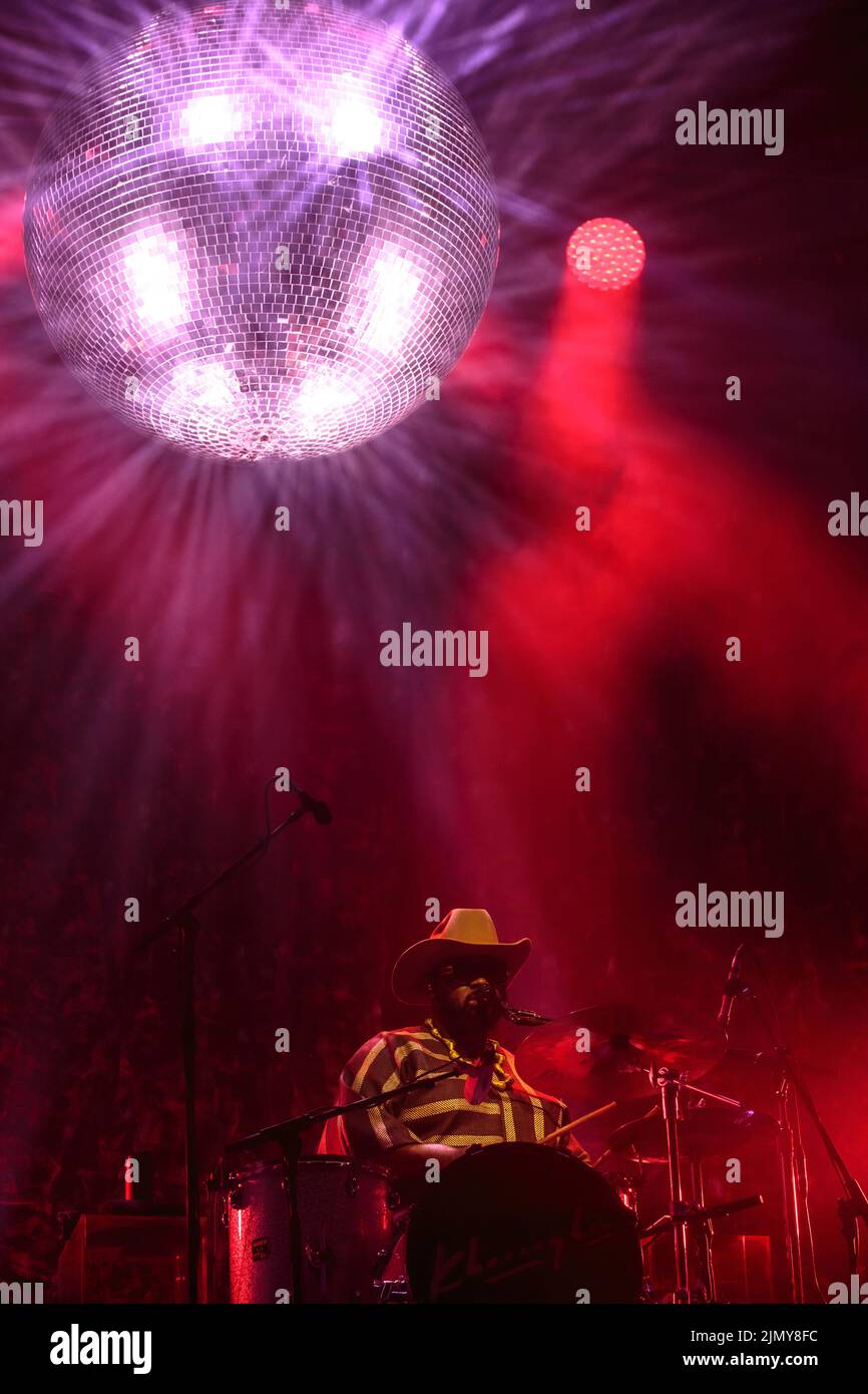 Drummer Donald "DJ" Johnson Jr. of Khruangbin performing on stage under ...
