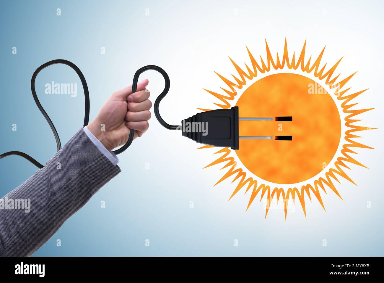 Solar energy concept with sun and socket Stock Photo - Alamy