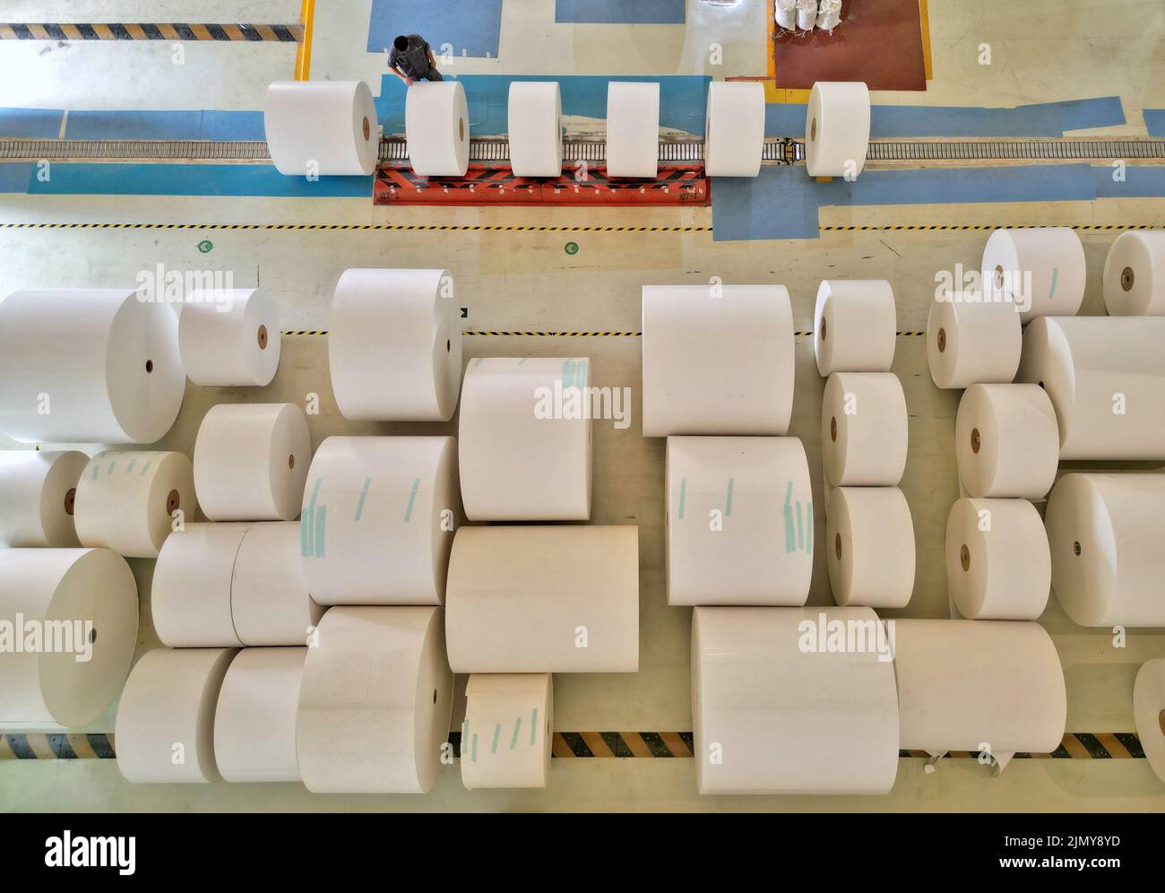 RIZHAO, CHINA - AUGUST 8, 2022 - Workers monitor the operation of a ...