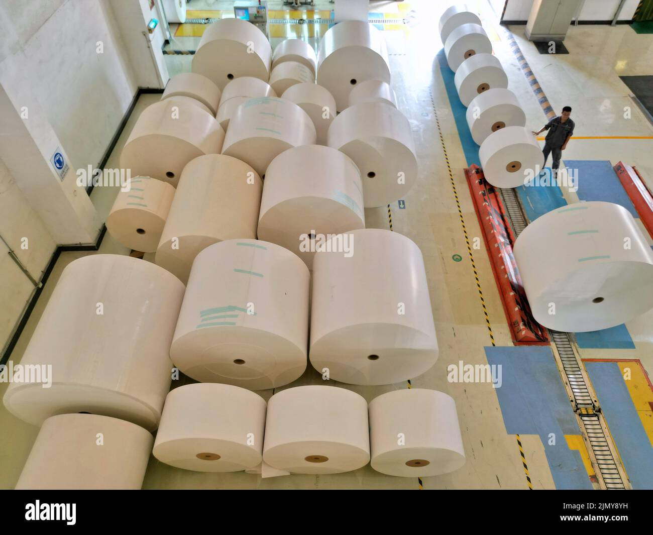RIZHAO, CHINA - AUGUST 8, 2022 - Workers monitor the operation of a ...