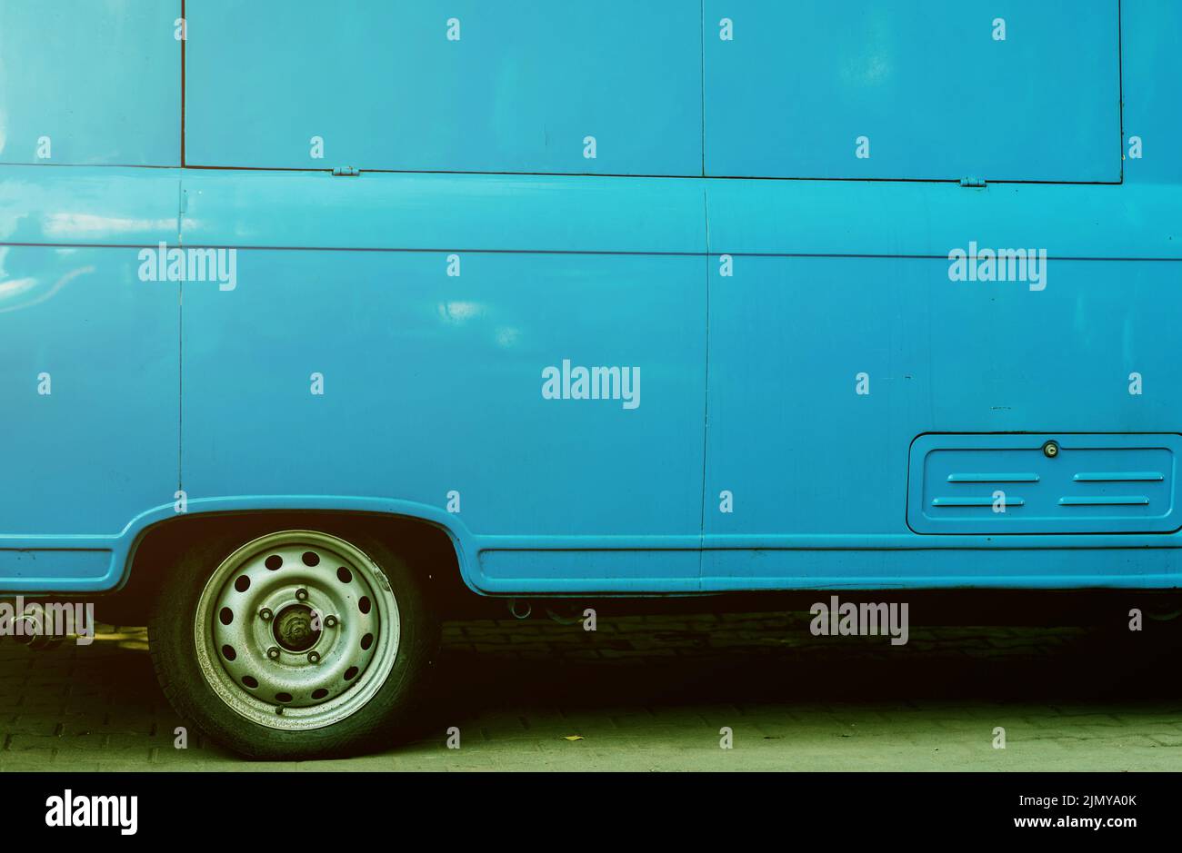 Old blue van. Oldtimer on the street. classic bus Stock Photo - Alamy