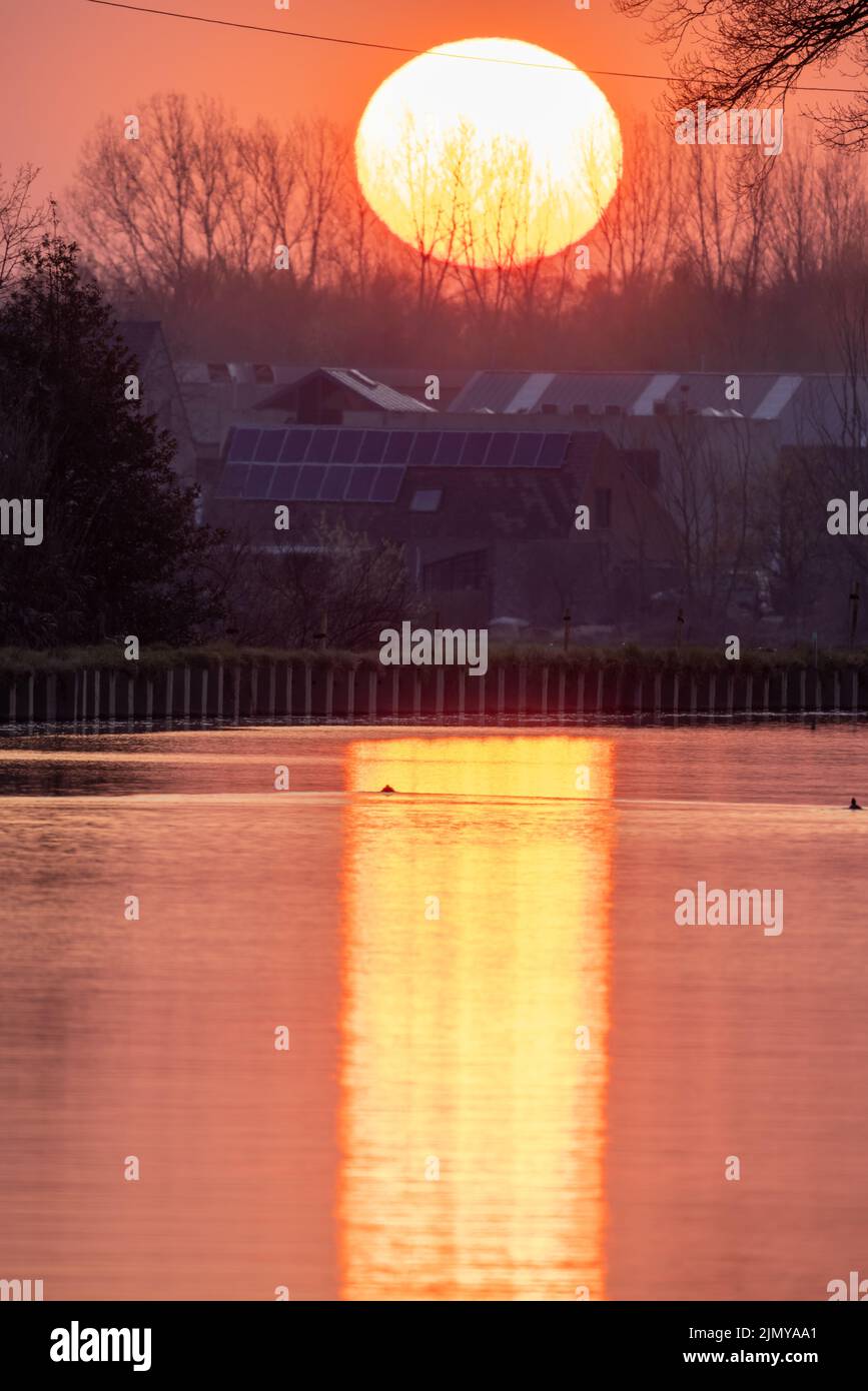 Sunset orange lake water reflection landscape. Reflection of sunset ...