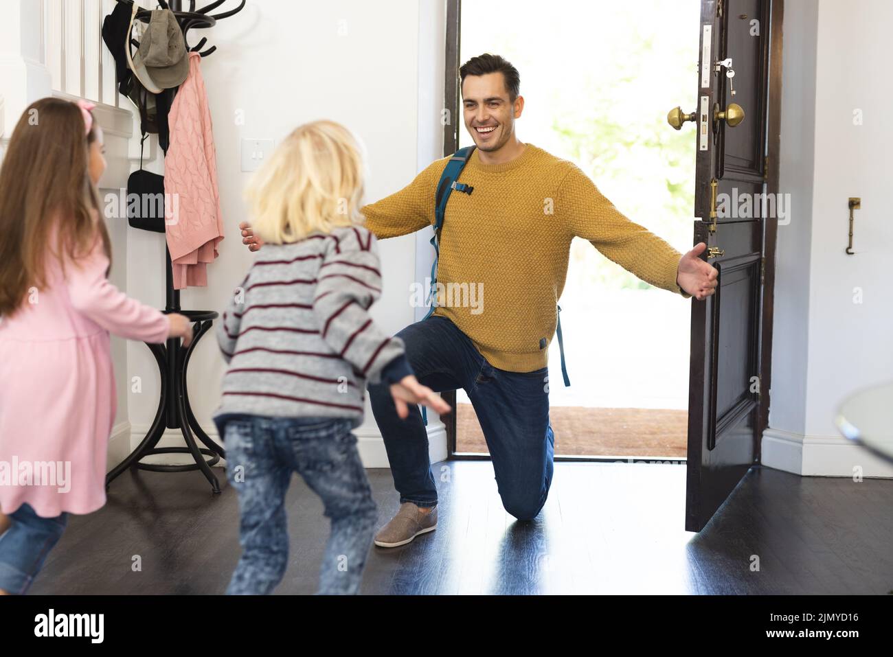 Son welcoming father home hi-res stock photography and images - Alamy