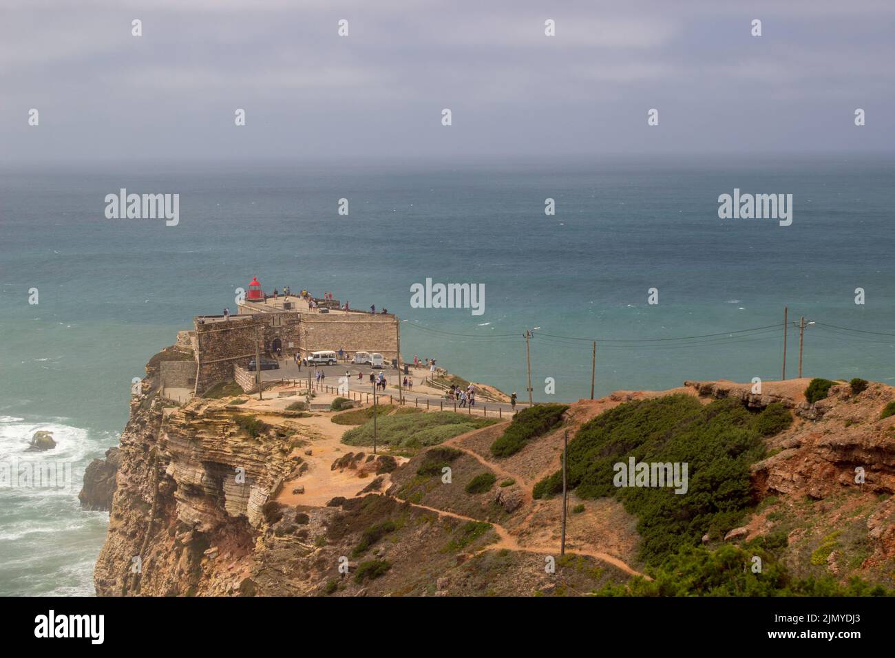 Fort at seaside of Portugal, Nazare. Lighthouse on the rocky cliff ...