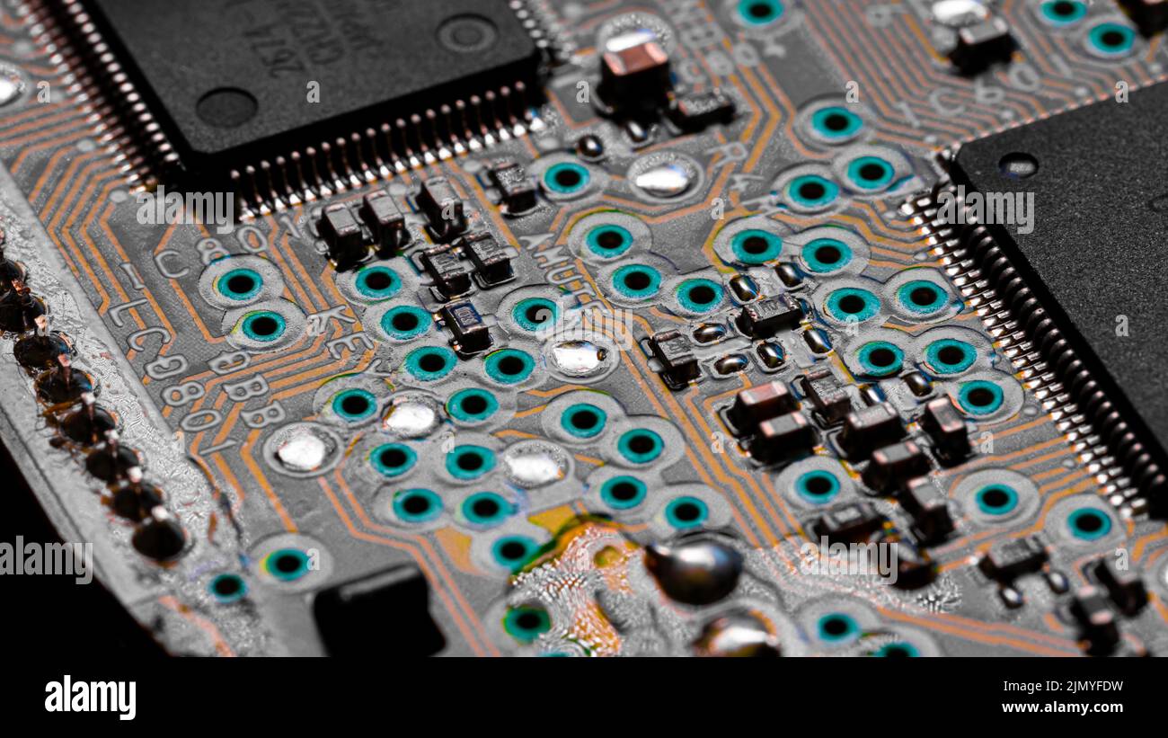 Macro Close up of printed wiring and components on PC circuit board ...