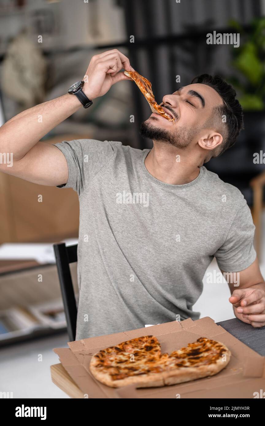 Man biting table hi-res stock photography and images - Alamy