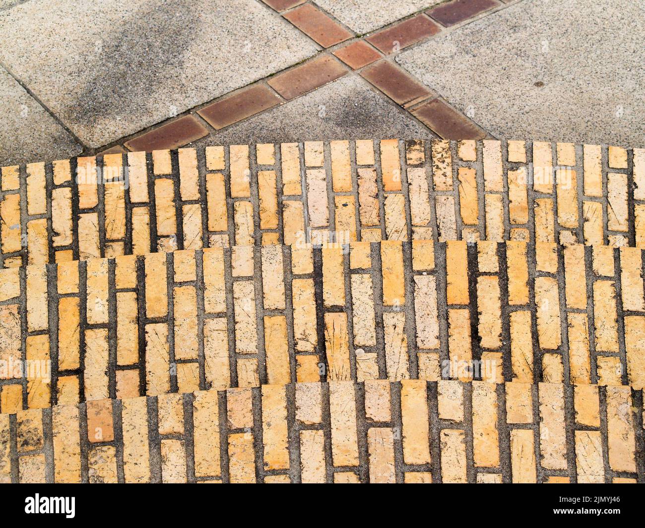 Brick and concrete pattern on path for background Stock Photo - Alamy