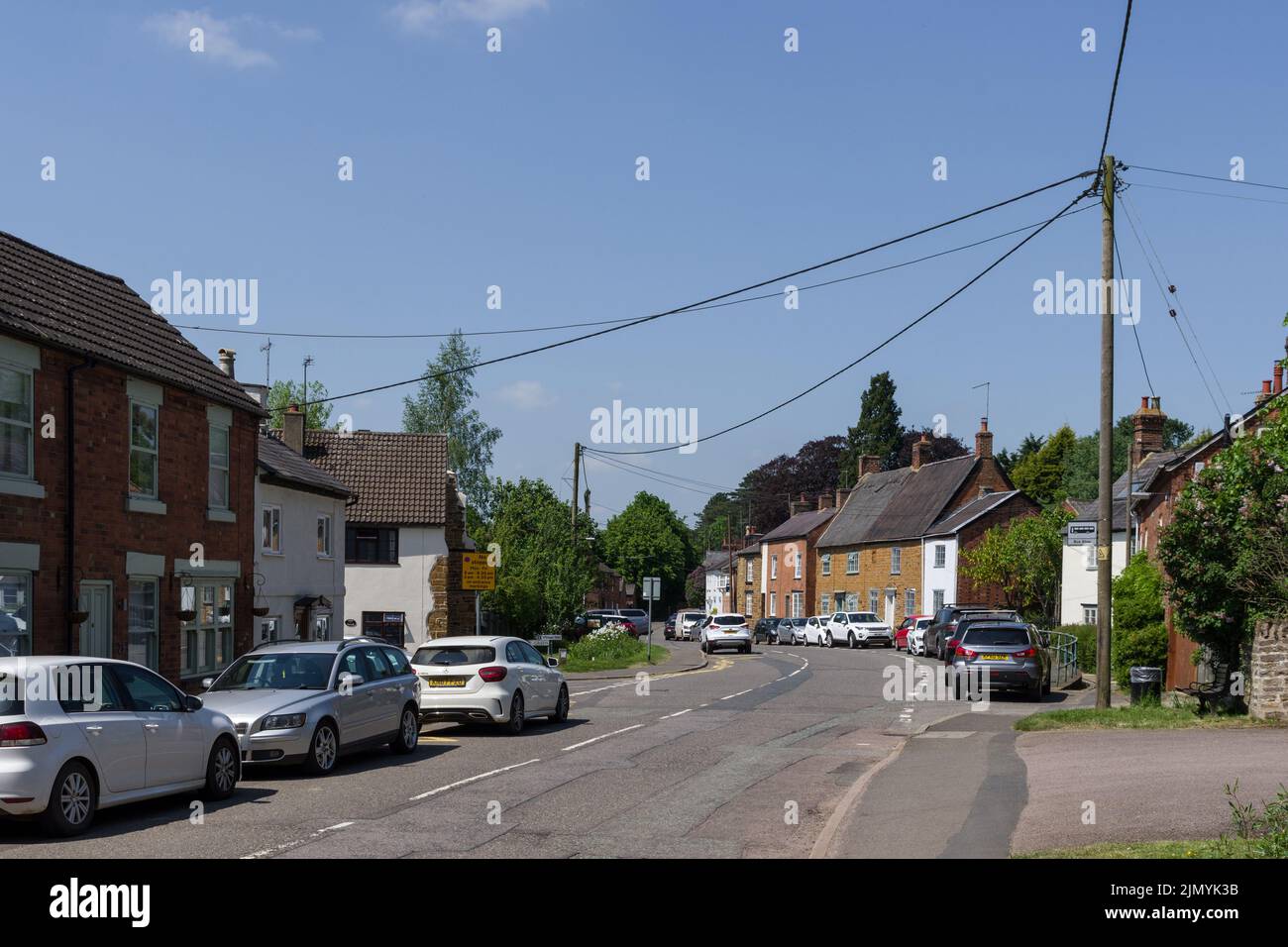 Street scene in summer in the village of West Haddon, Northamptonshire ...