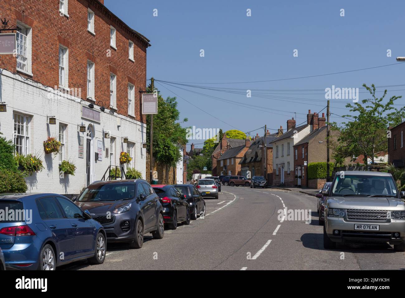 Street scene in summer in the village of West Haddon, Northamptonshire ...