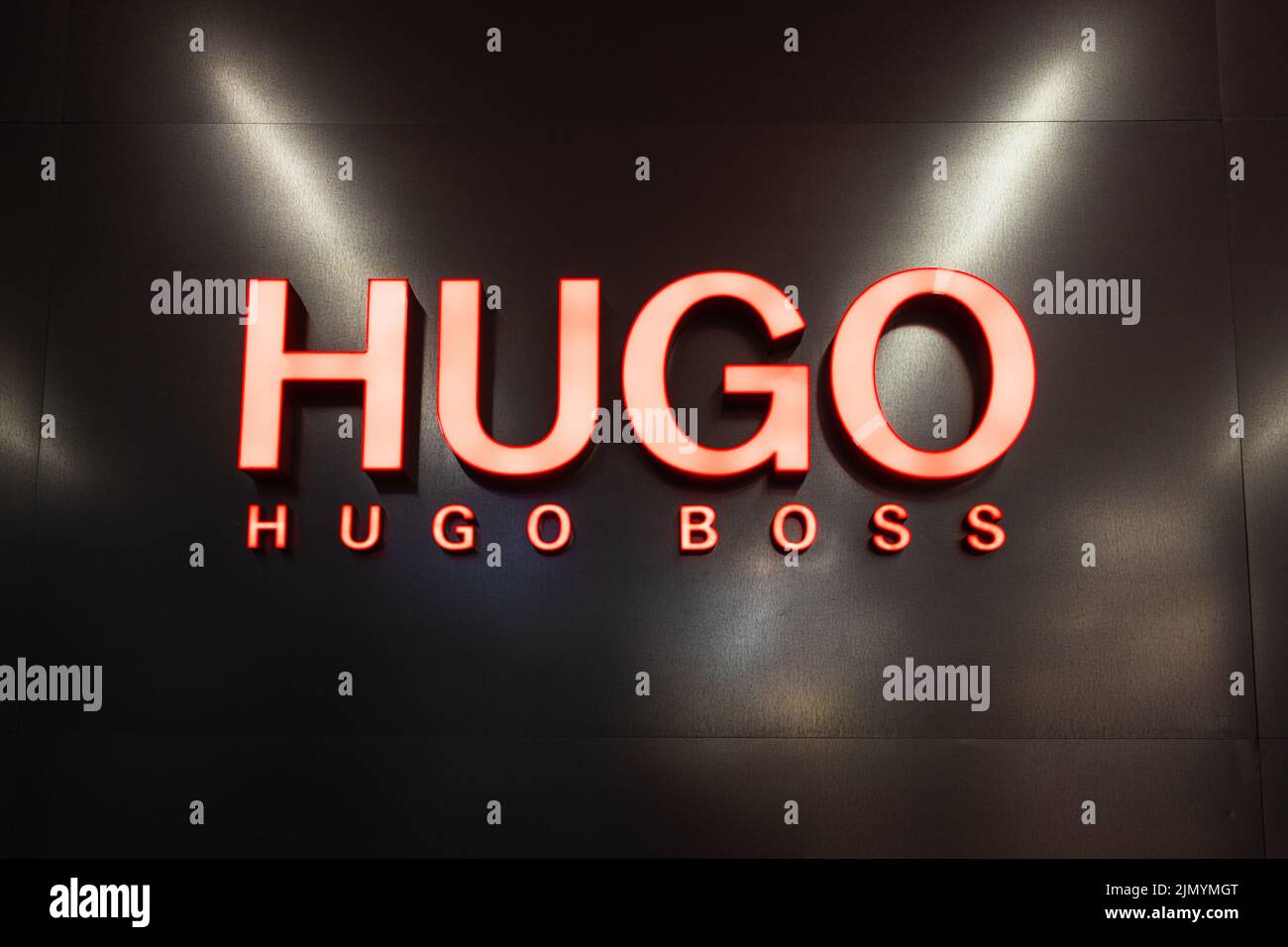 Logotype logo sign of Hugo Boss on the wall of the store. Kaunas ...