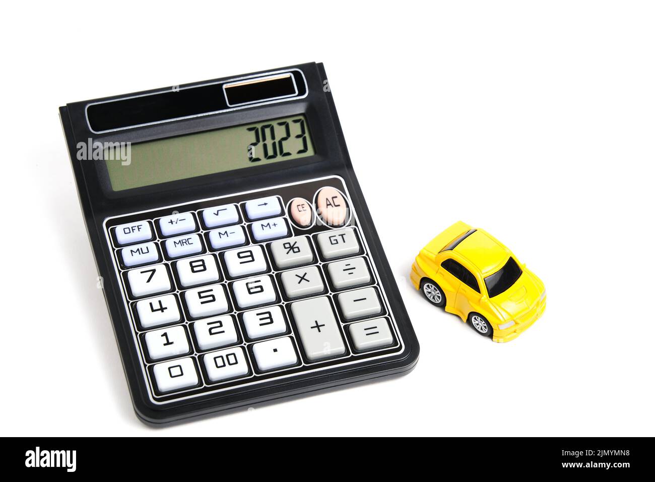 Toy car and calculator white background.Concept buying car Stock Photo ...